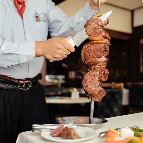Brazilian Steakhouse Fogo De Chao Brings Skewered Meats To Metro