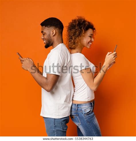 3298 Couple Side Mobile Royalty Free Photos And Stock Images Shutterstock