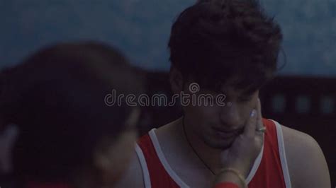 Indian Mother Gives Her Son Love And Affection Stock Footage Video