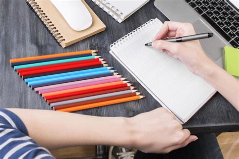 Premium Photo Girl Writing In Notepad Top