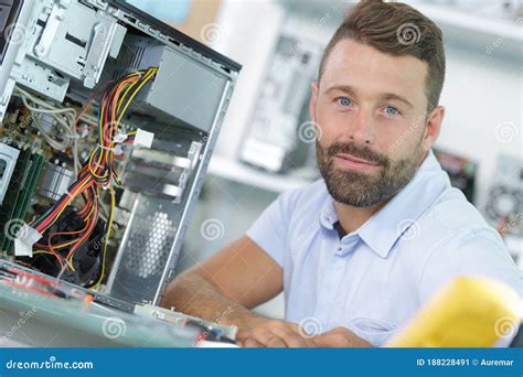 Professional Man Repairing And Assembling Computer Desktop Stock Image