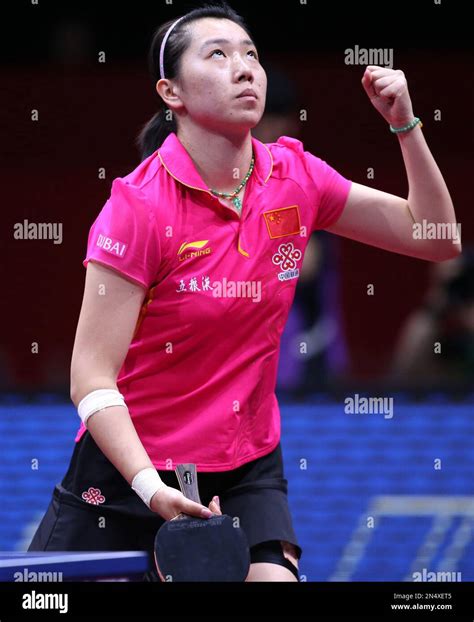 Li Xiaoxia Of China Reacts As She Won A Point Against Singapores Feng