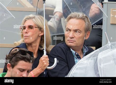 Karine Paschal And Husband Gilles Cohen In The Stands During Roland Garros 2022 On May 22 2022