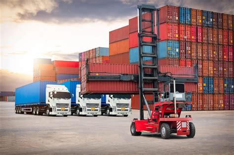 Premium Photo Container Crane Tractor Unloading Container Box With