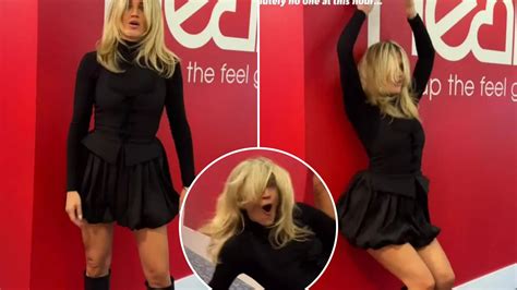 Ashley Roberts Risks Flashing Fans As She Drops To The Floor And Rolls