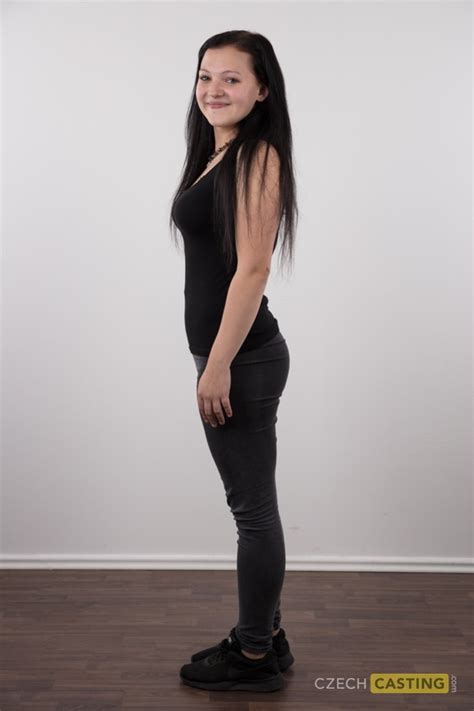 Sexy Brunette Daniela Takes A Seat On A Stool After Getting Completely