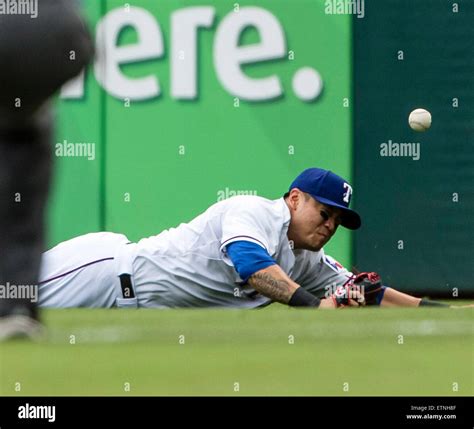 Texas Rangers Right Fielder Shin Soo Choo 17 Makes A Diving Attempt