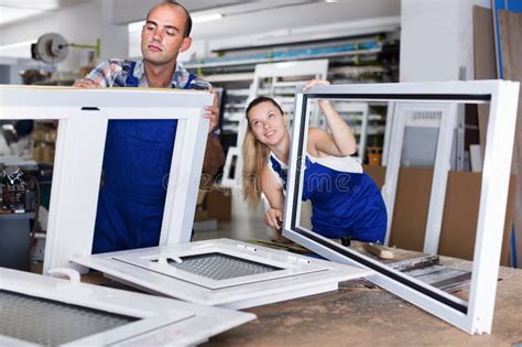 Workman And Workwoman Assembling Plastic Windows Stock Image Image Of Foreman Processing