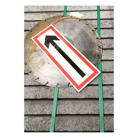 Premium Photo Low Angle View Of Arrow Symbol On Wall