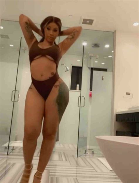 Cardi B Shows Off Her Bare Butt In A Thong Swimsuit As She Struts Around Bathroom In Heels The