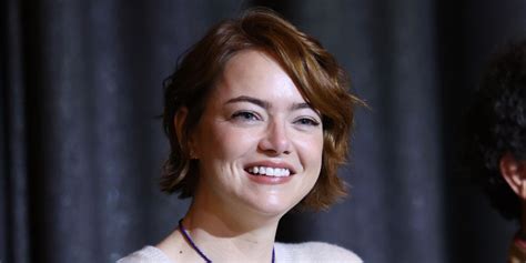 Emma Stone Pairs Her Xxl Sweater With The Tiniest Silk Miniskirt