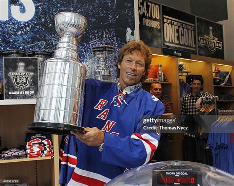 New York Ranger Alum Ron Duguay Hoists A Replica Of The Stanley Cup