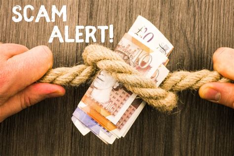 Writing Note Showing Scam Alert Business Photo Showcasing Fraudulently