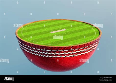 A Cricket Ball Split In Half Revealing A Marked Green Grass Cricket