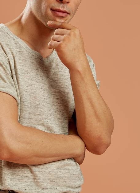 Premium Photo Thinking Muscled Male Model