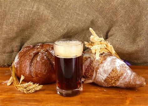 Premium Photo Glass Of Kvass With Bread On Canvas Background Closeup