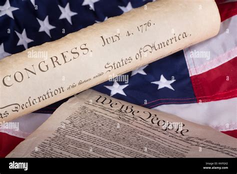 Declaration Of Independence And Constitution On An American Flag Stock