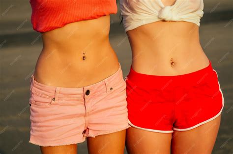 Double Belly Button Piercing And Hips