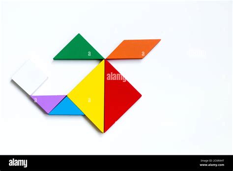 Colorful Wood Tangram Puzzle In Helicopter Shape On White Background