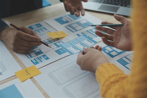 Premium Photo Close Up Ux Developer And Ui Designer Brainstorming