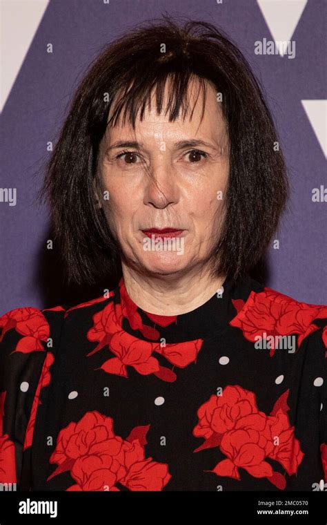 Tamar Thomas Poses For Photographers Upon Arrival At The Academy Awards Champagne Reception In