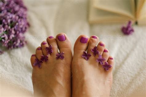 Female Feet With Purple Pedicure And Lilac Cozy Leisure Scene Woman