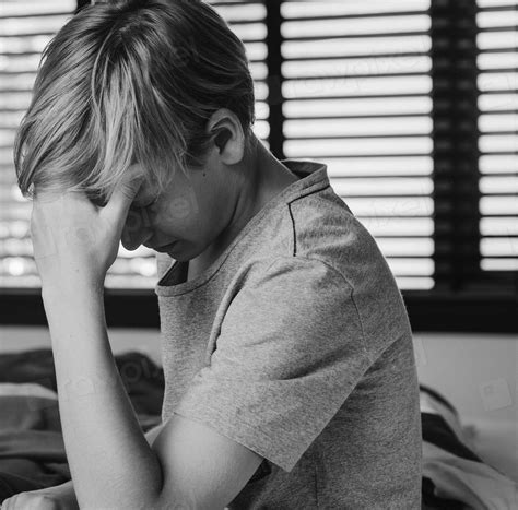 Young Upset Boy Sitting Bed Premium Photo Rawpixel