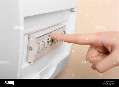 Woman Turning Off Fuse Box Close Up Stock Photo Alamy