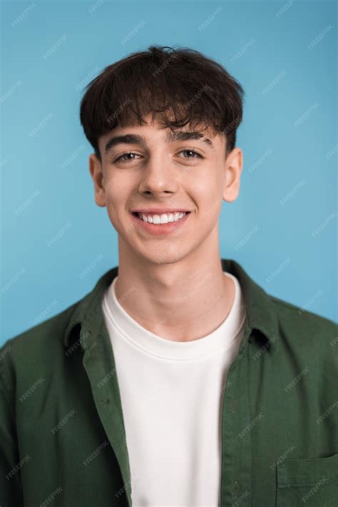Free Photo Portrait Of A Smiling Young Man