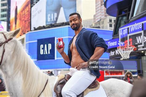 Old Spice Actor Isaiah Mustafa Poses On A Horse In Times Square On