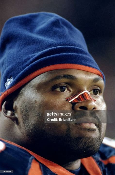 Defensive End Neil Smith Of The Denver Broncos Looks On During The