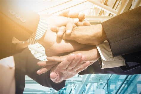 Premium Photo Touching Hand Team Work