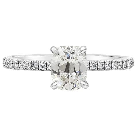 Cushion Cut Diamond Engagement Ring With Diamond Pave In Yellow Gold At
