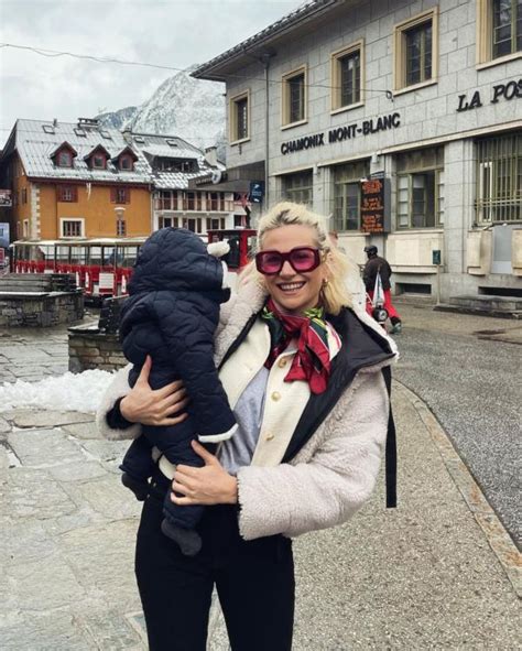 Pixie Lott Stuns In White Jacket And Maroon Glasses