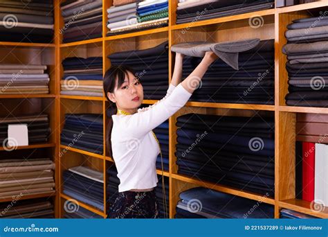 Modern Chinese Salesgirl Working In Fabric Store Stock Image Image Of