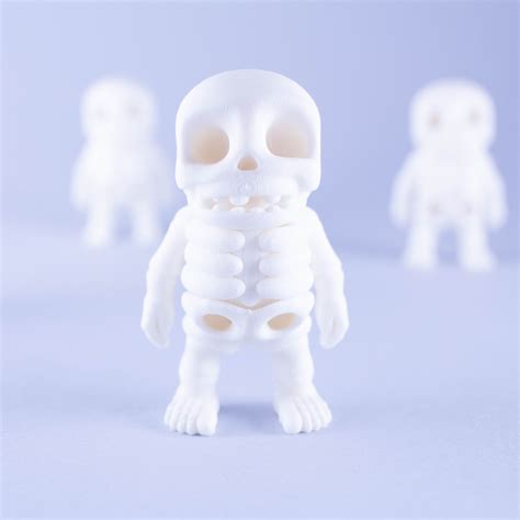 Tiny Articulated Skeleton 3d Printed Designed By Zou3d Etsy