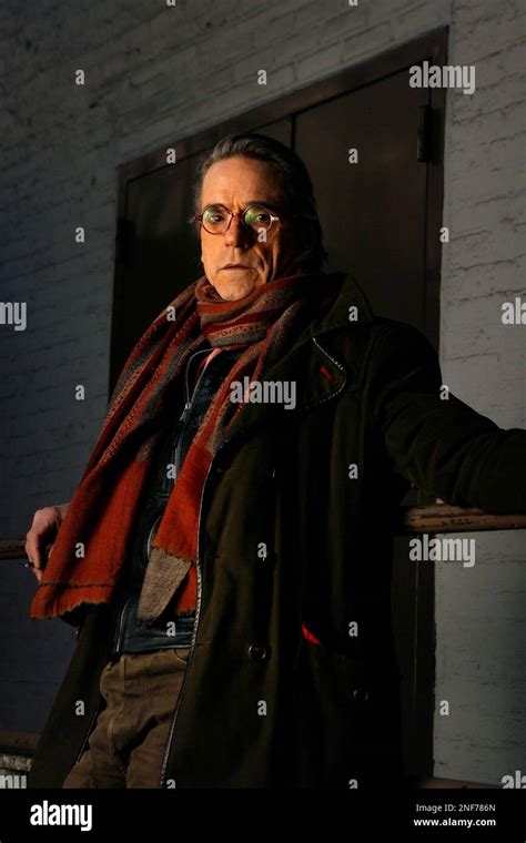Actor Jeremy Irons Poses For A Picture In The Alley Next To The