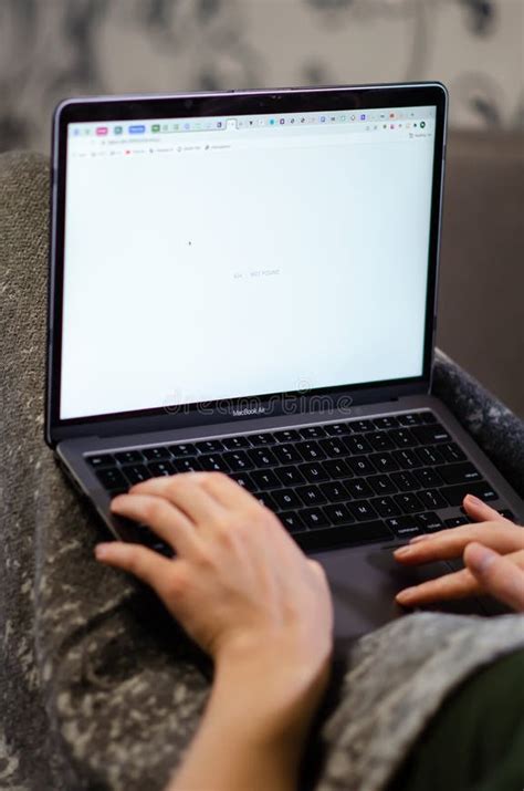 london uk january 12 2022 caucasian man uses macbook air m1