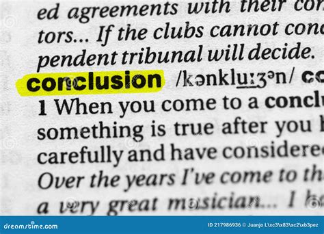 The Word Conclusion Appearing Behind Torn Brown Paper Royalty Free