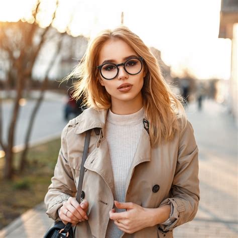 Premium Photo Pretty Woman In Fashionable Glasses And A Stylish Coat