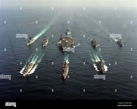 An Aerial Bow View Of The Aircraft Carrier Uss Kitty Hawk Cv 63 And Its Battle Group Underway