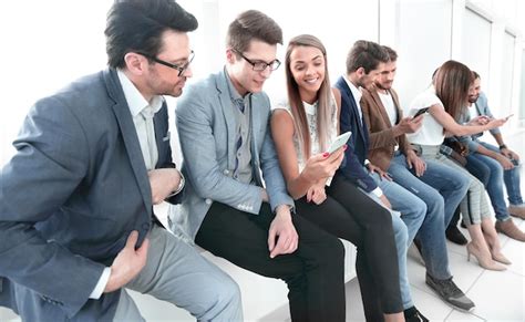 Premium Photo Group Of Young People Use Their Smartphones