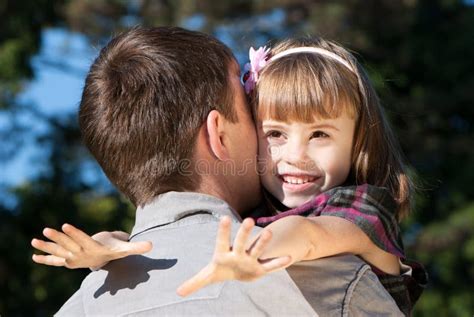 Girl Hugging Dad At Charles Zeigler Blog