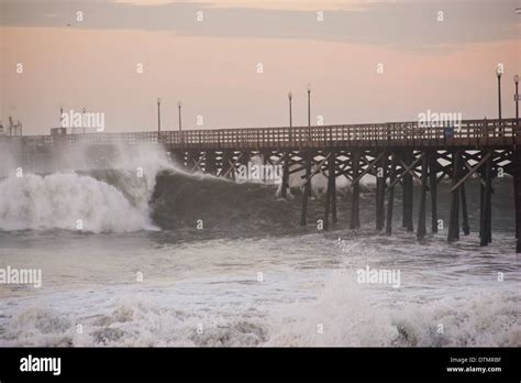 Seal Beach California Pier With Large Huge Massive Waves Crashing