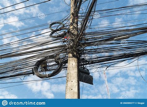 Busy High Voltage Cables With The Cable On The Electric Pole On The Sky
