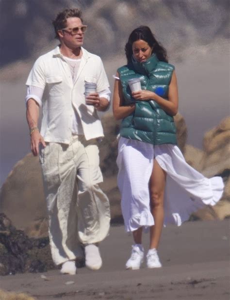 Brad Pitt Girlfriend Ines De Ramon Keep Close On Beach Stroll Photos