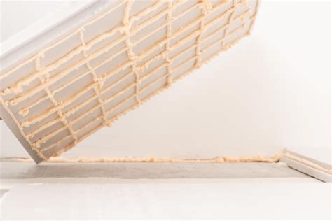 Feuille De Styromousse En Mousse Pour Le Coller Au Sol Photo Premium