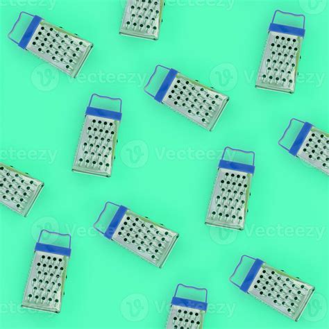 Small Stainless Steel Graters Lies On A Pastel Colored Paper Kitchen Accessories Tools For