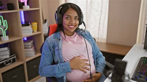 Lit From Within A Young Pregnant Latina Streamer Beaming And Touching