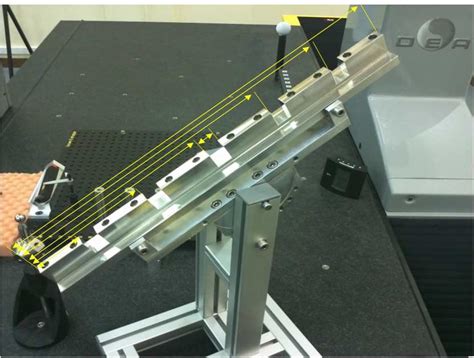 a the step gauge artefact with its seven standard lengths and the test